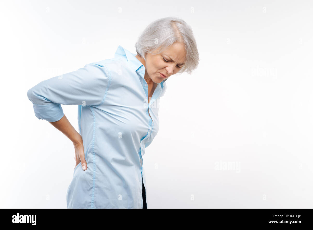 Wince pain hi-res stock photography and images - Alamy