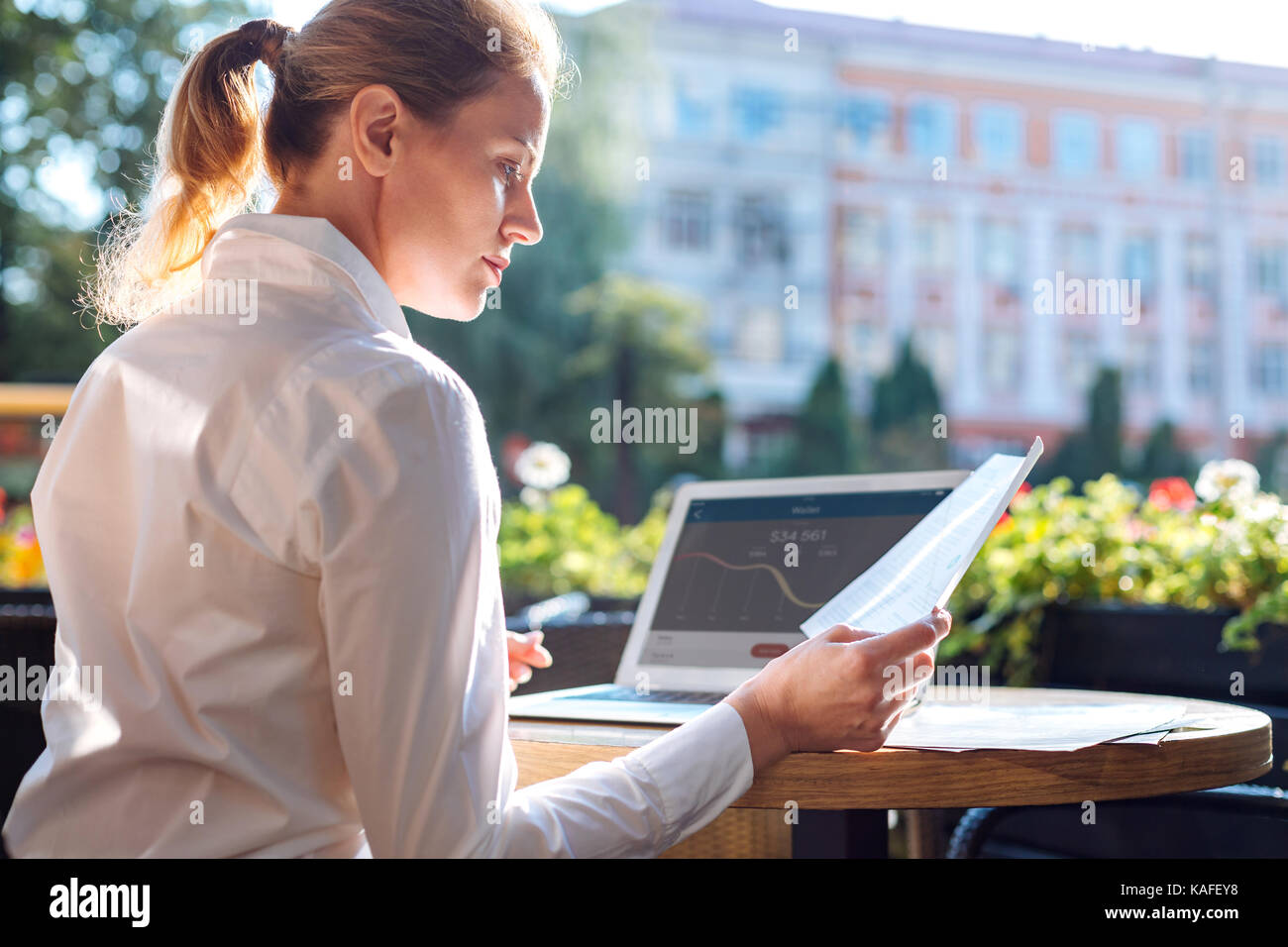 Studying a printout hi-res stock photography and images - Alamy