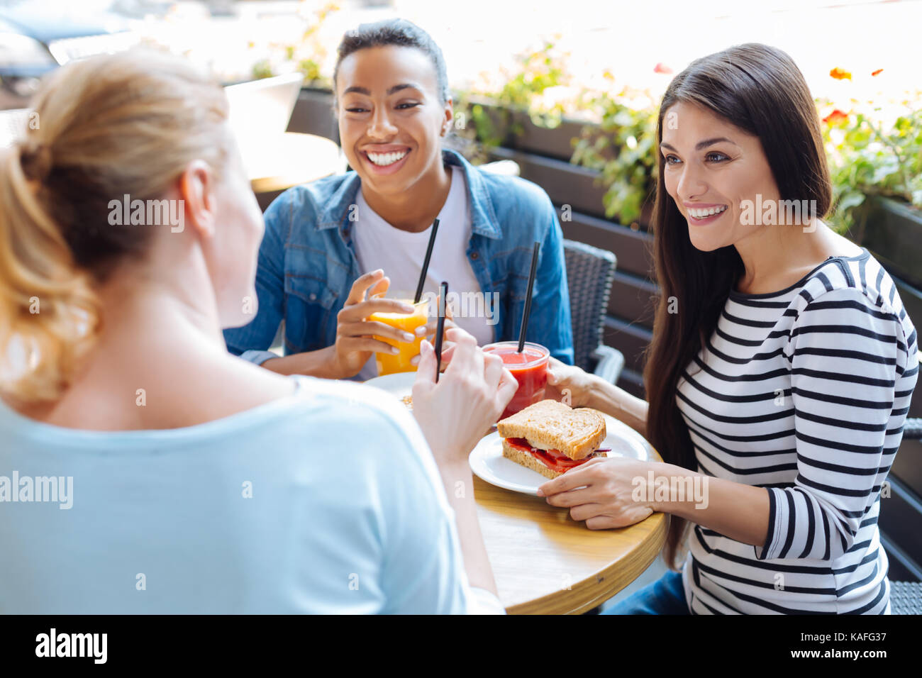 Female telling jokes hi-res stock photography and images - Alamy