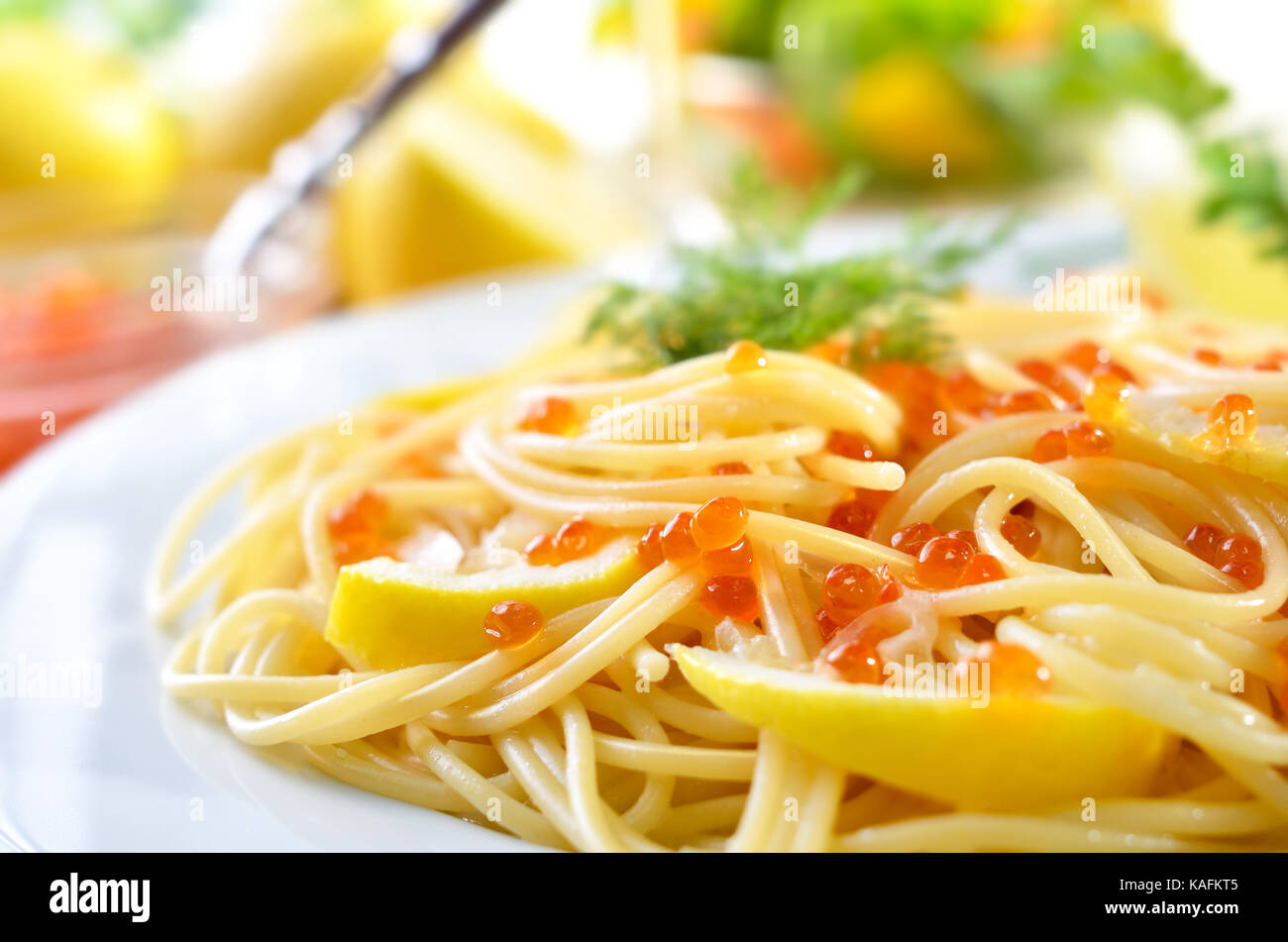 Italian spaghetti with lemon sauce and Russian trout caviar Stock Photo ...