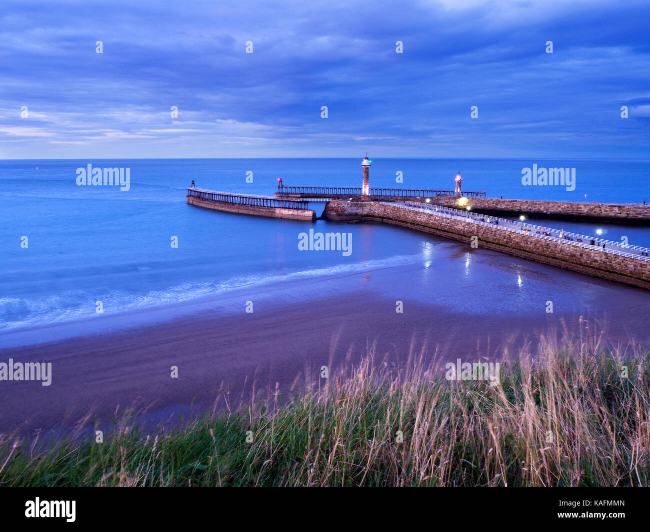 Whitby Piers at Dusk Whitby Yorkshire England Stock Photo - Alamy