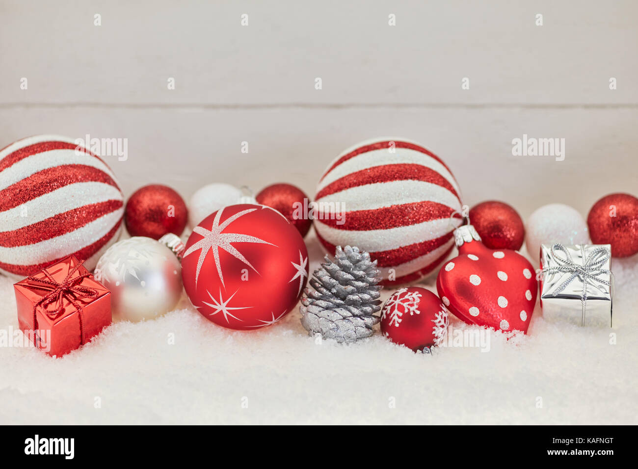 Red christmas background with snow and recoration Stock Photo - Alamy