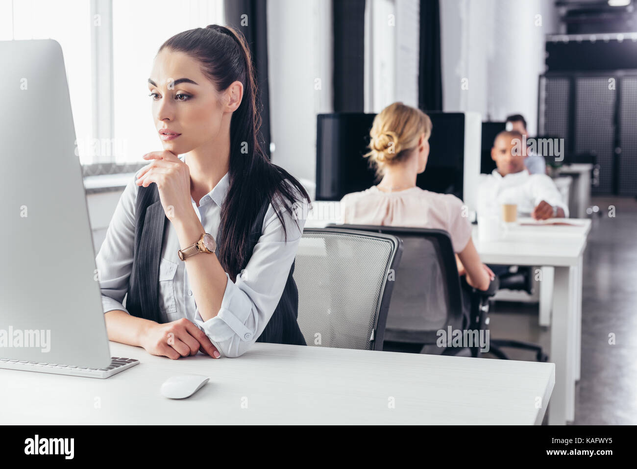 businesswoman using desktop computer Stock Photo - Alamy