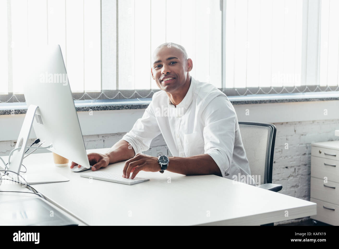 businessman using desktop computer Stock Photo - Alamy