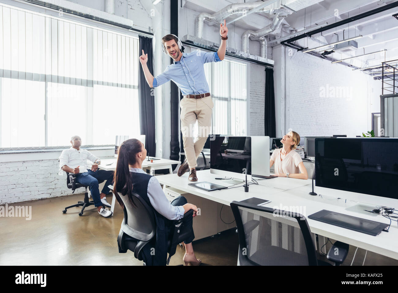 excited business colleagues Stock Photo - Alamy