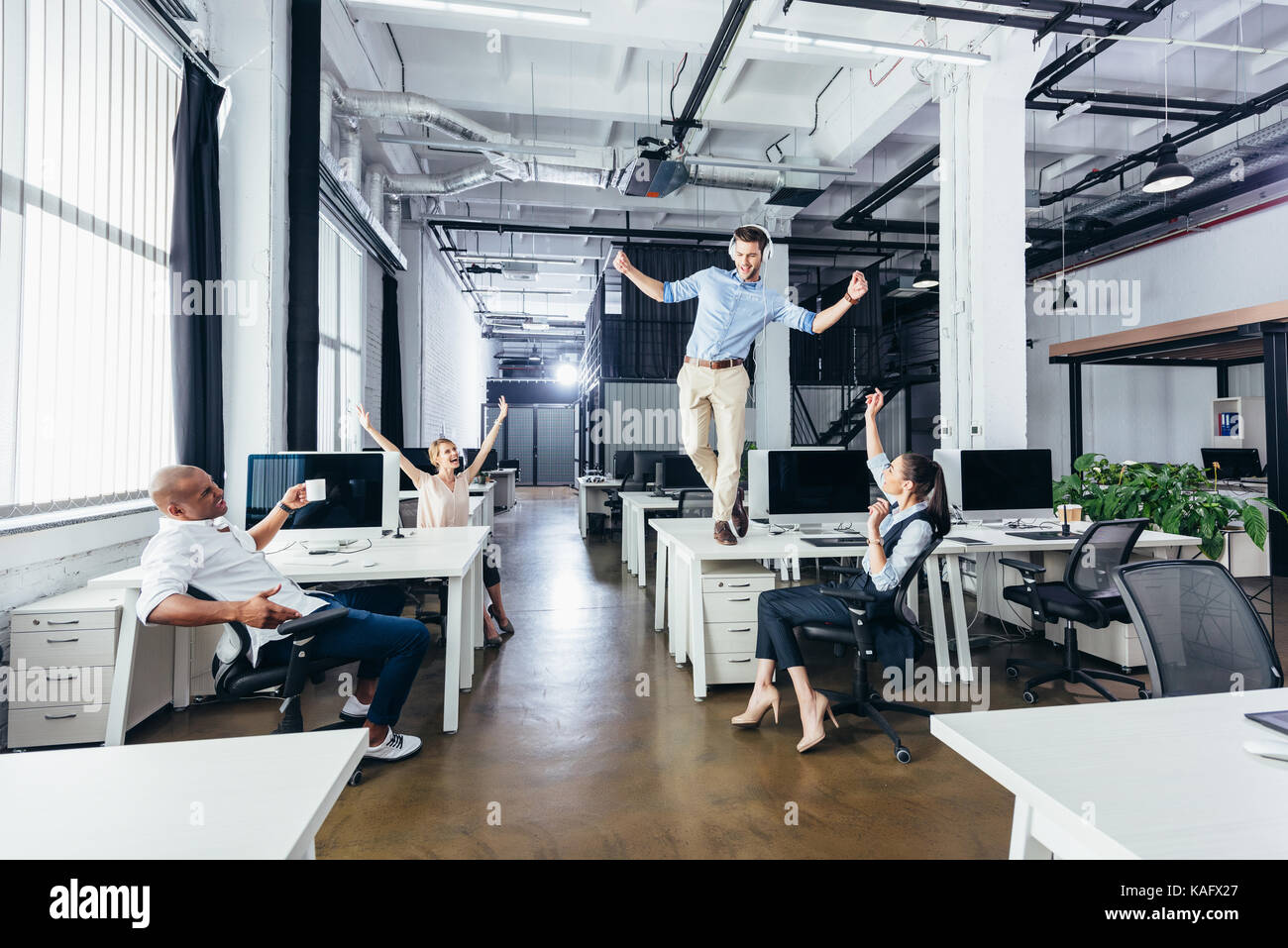 Dancing on table office hi-res stock photography and images - Alamy