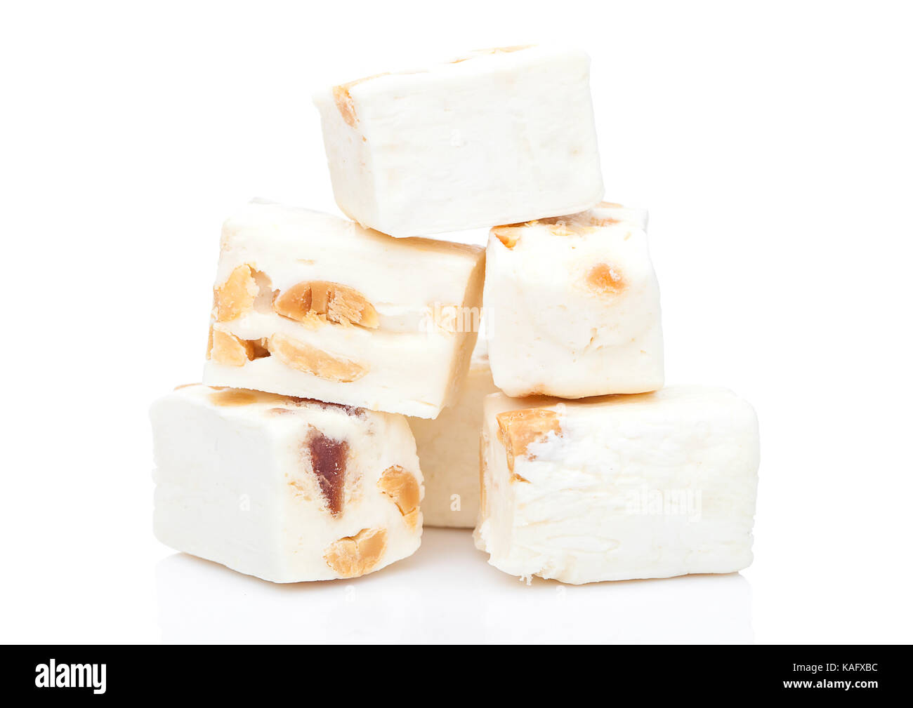 Nut nougat bar traditional sweet candy on white background Stock Photo ...
