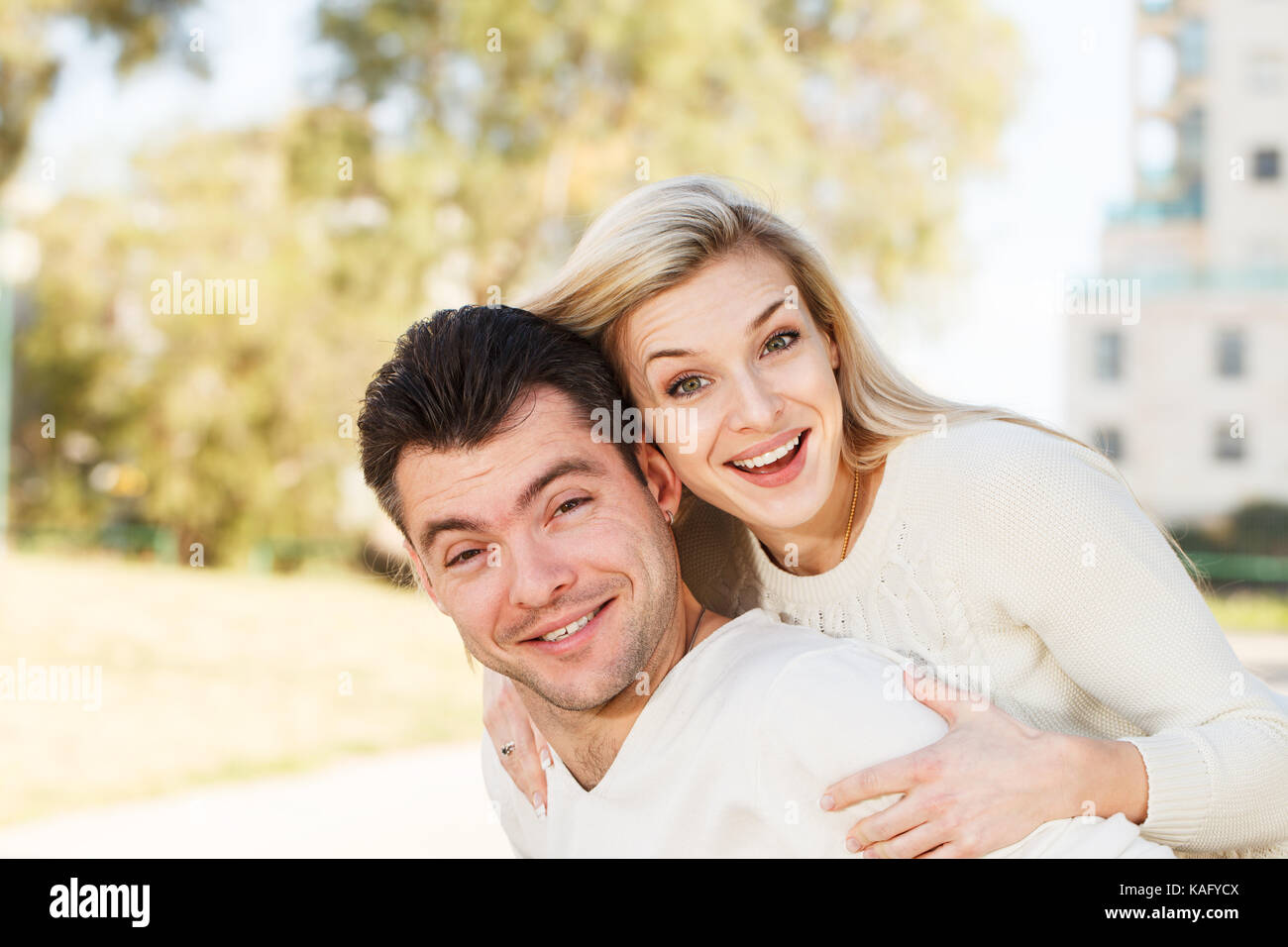 Disabled man and his girlfriend piggyback Stock Photo - Alamy