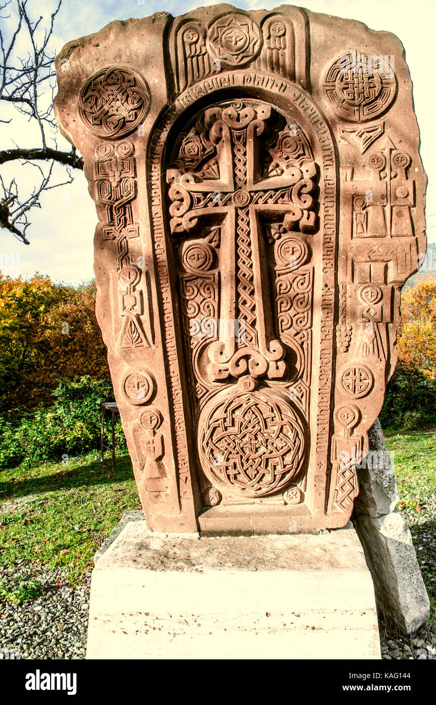 Stone cross monument of reunification Armenian people's in autumn park ...