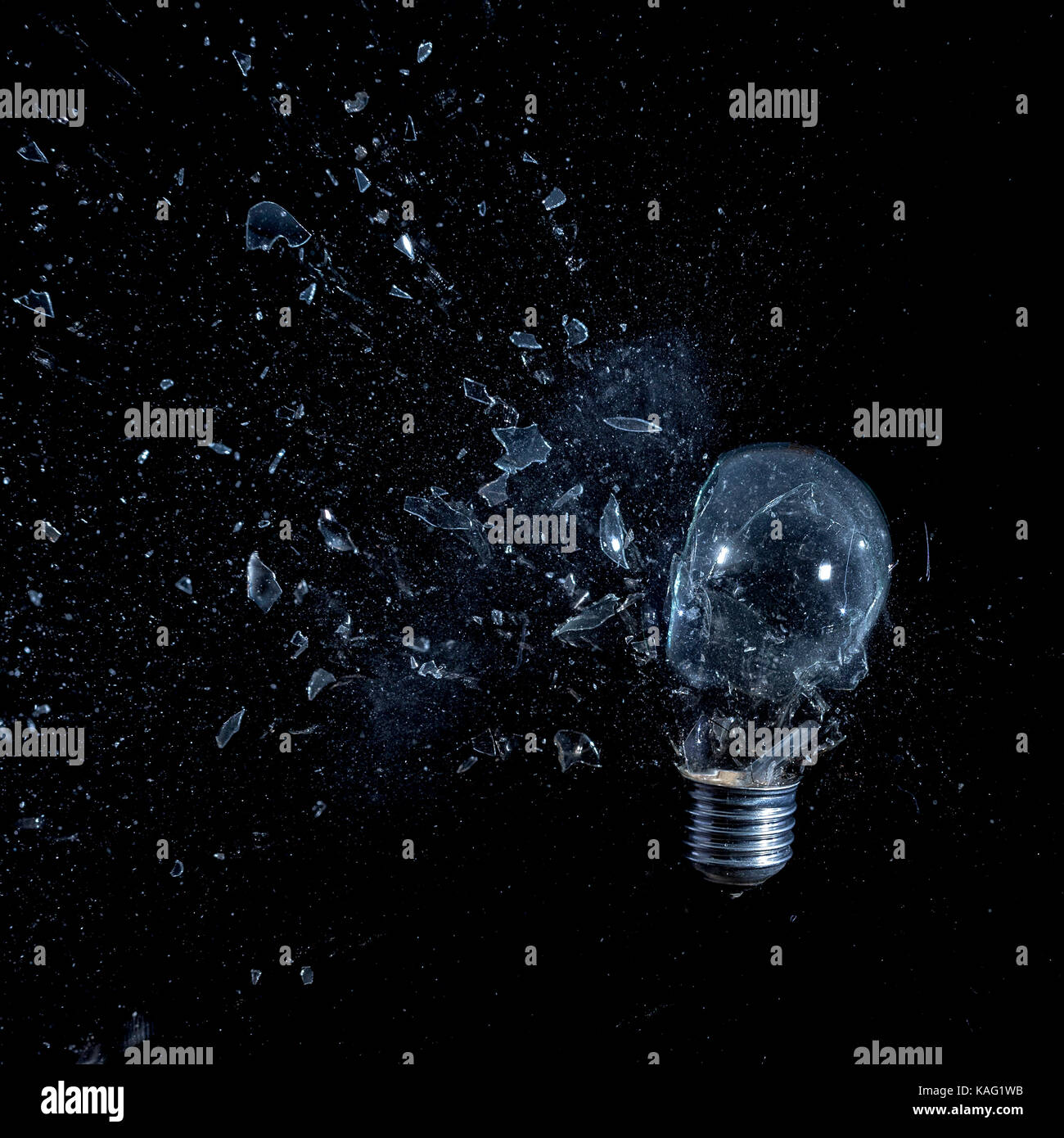 glass bulb explosion on black background Stock Photo - Alamy