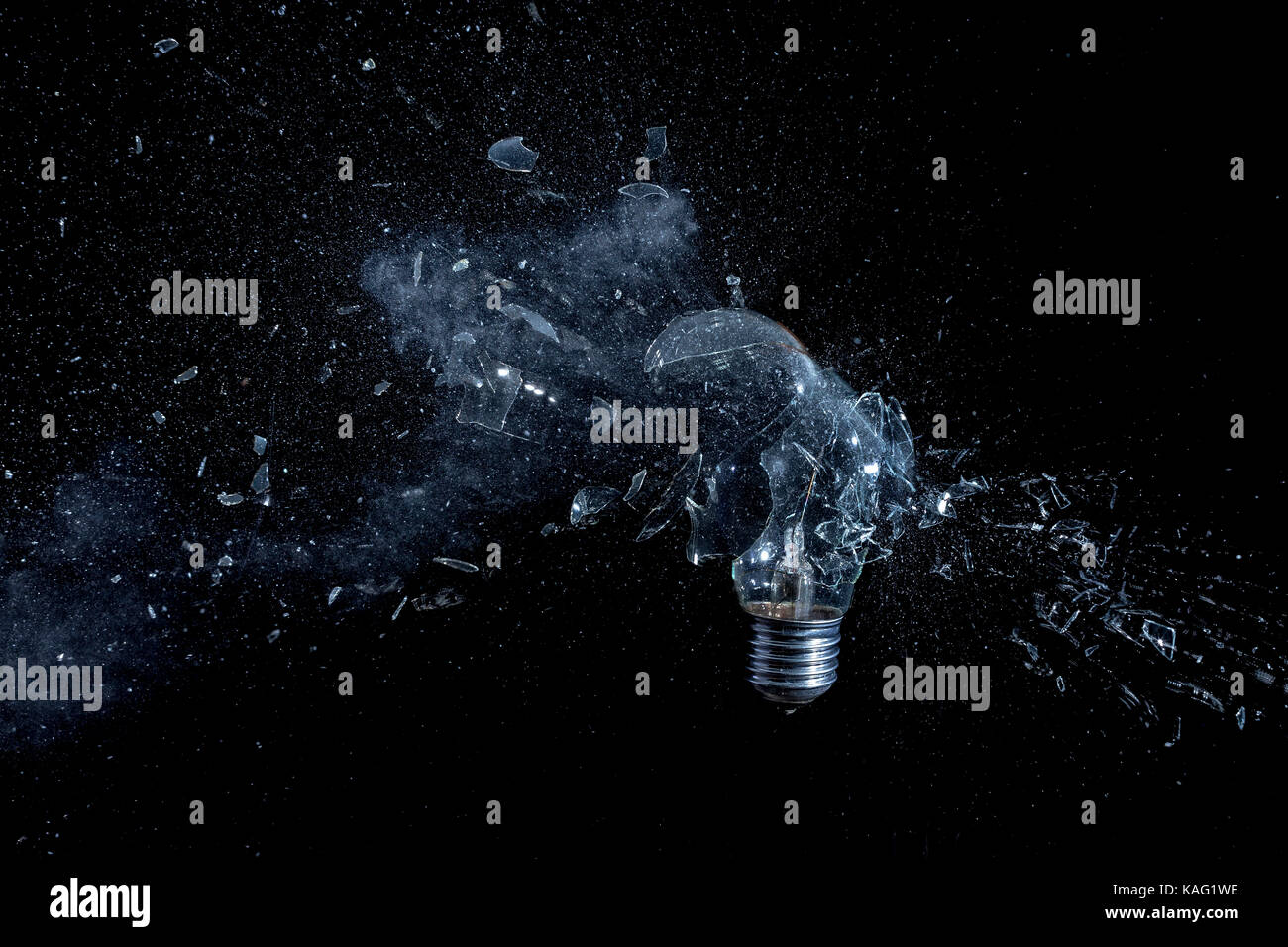 glass bulb explosion on black background Stock Photo - Alamy