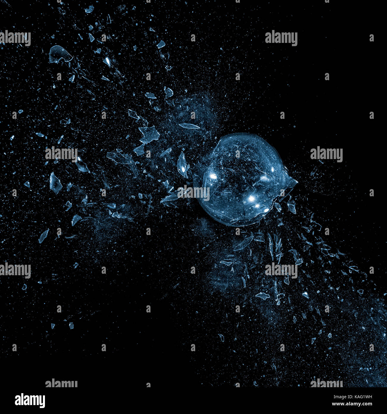 glass bulb explosion on black background Stock Photo - Alamy
