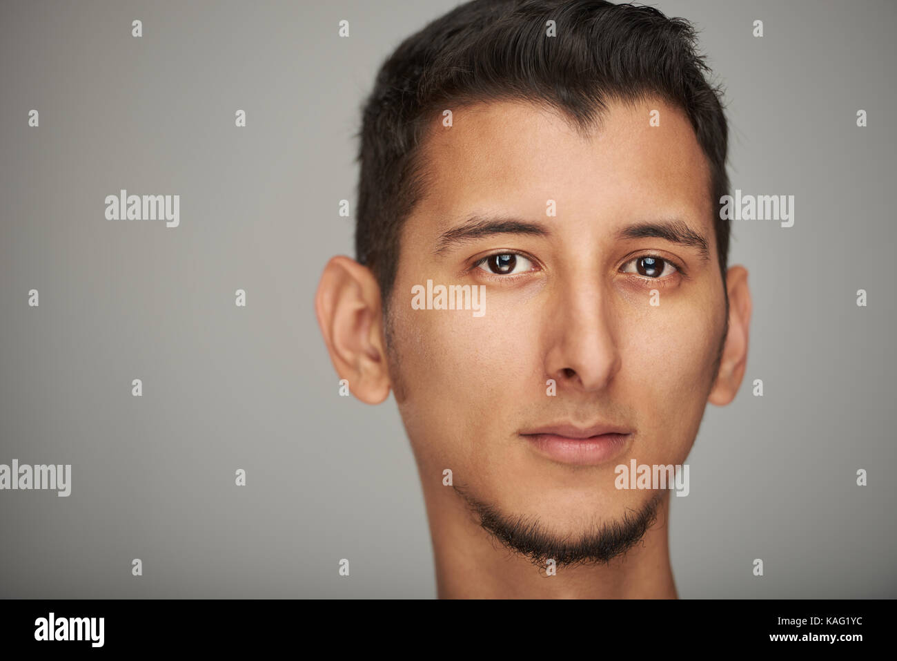 Close-up portrait of hispanic young man. Head of attractive man Stock ...