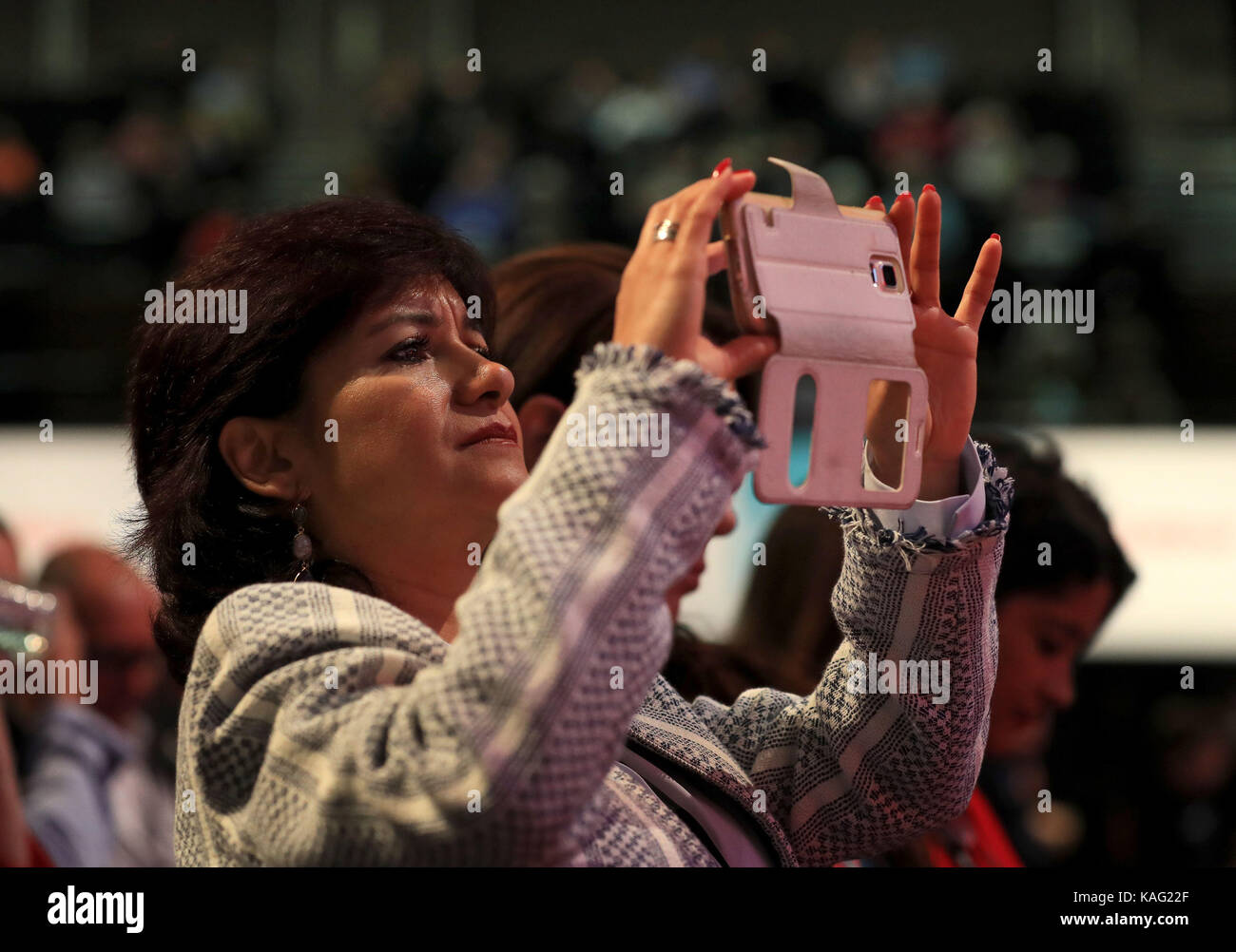 Laura Alvarez, wife of Labour leader Jeremy Corbyn, takes a picture ...