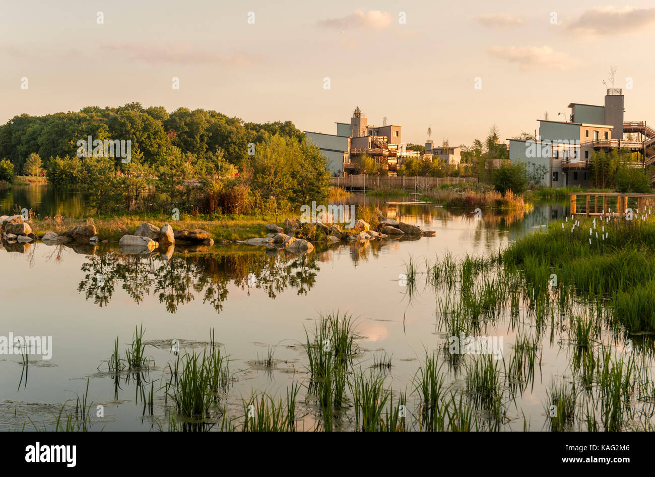 Evening twilight at the artificial lake of the Villages Nature Paris ...