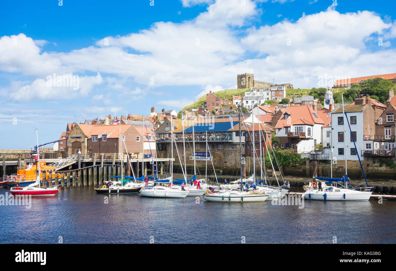 Whitby, North Yorkshire. UK. View over yachts towards St Mary`s church ...