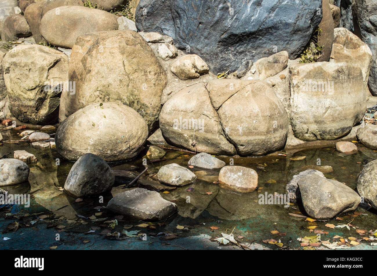 rocky water reflection simple relaxing landscape Stock Photo - Alamy