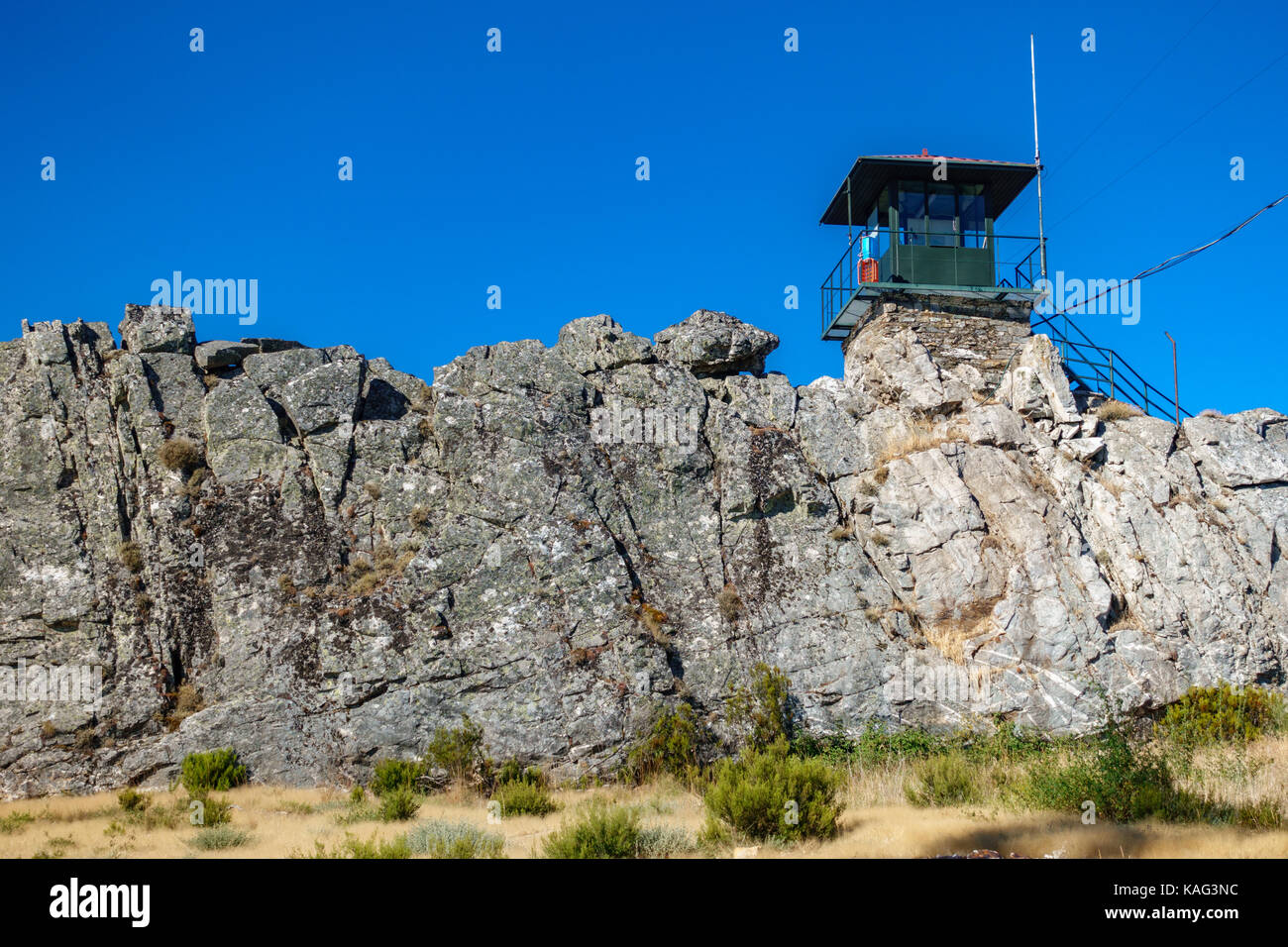 Fire watching hut over the rocks Stock Photo - Alamy