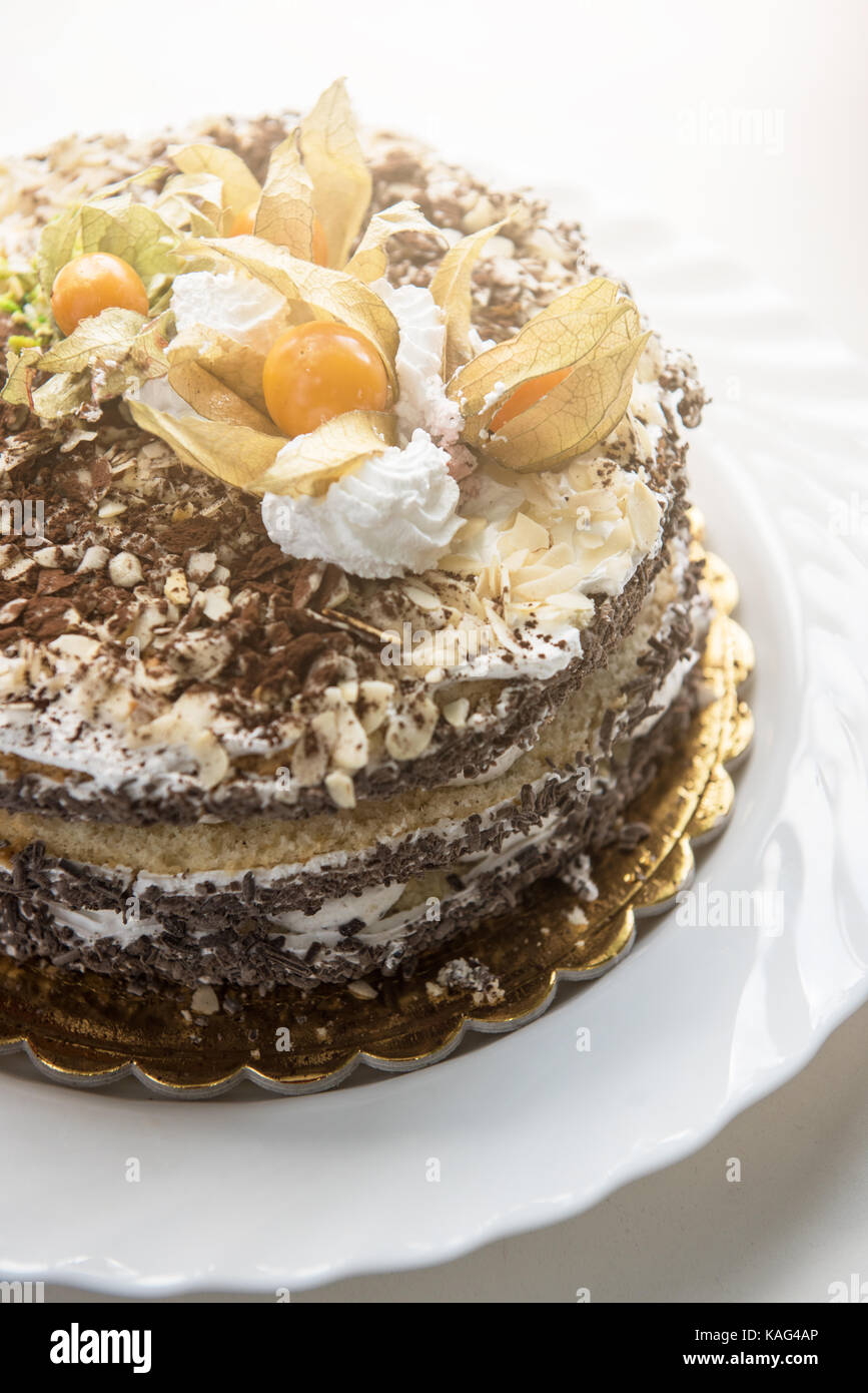 cake with walnuts and physalis Stock Photo - Alamy