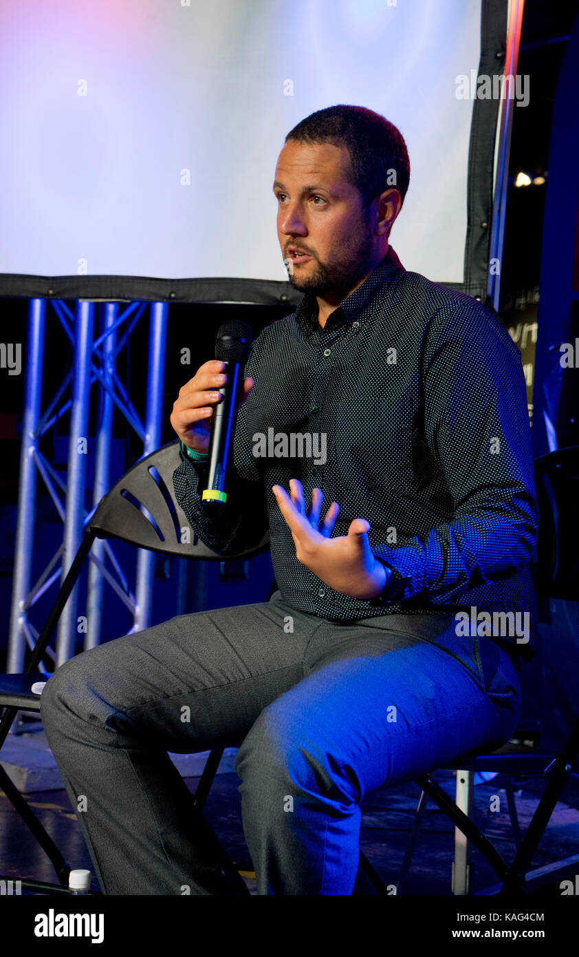 Activist Adam Klug speaking at a meeting during The World Transformed ...