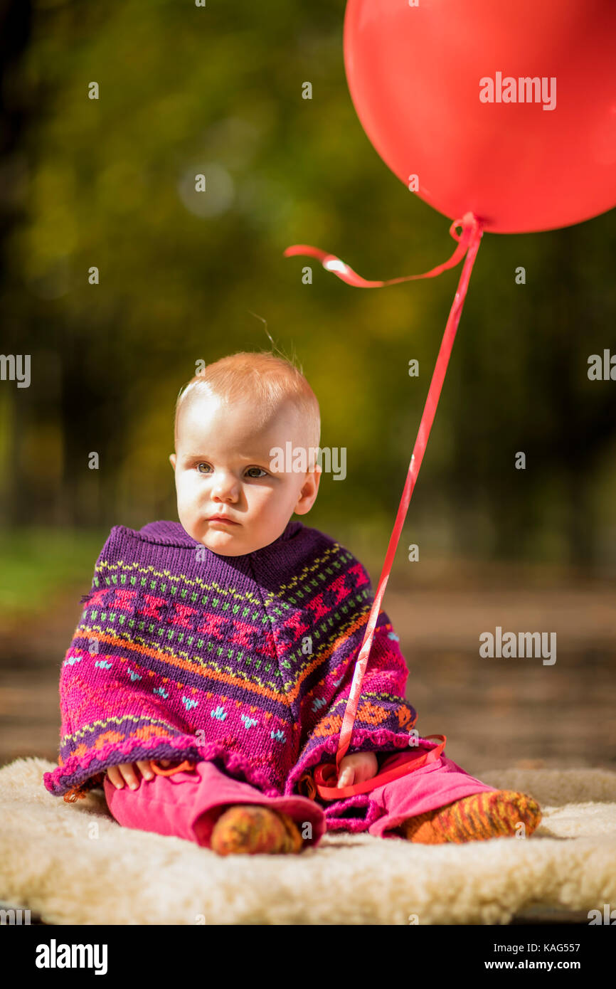 cute happy child baby playing outside in autumn fall sun Stock Photo ...