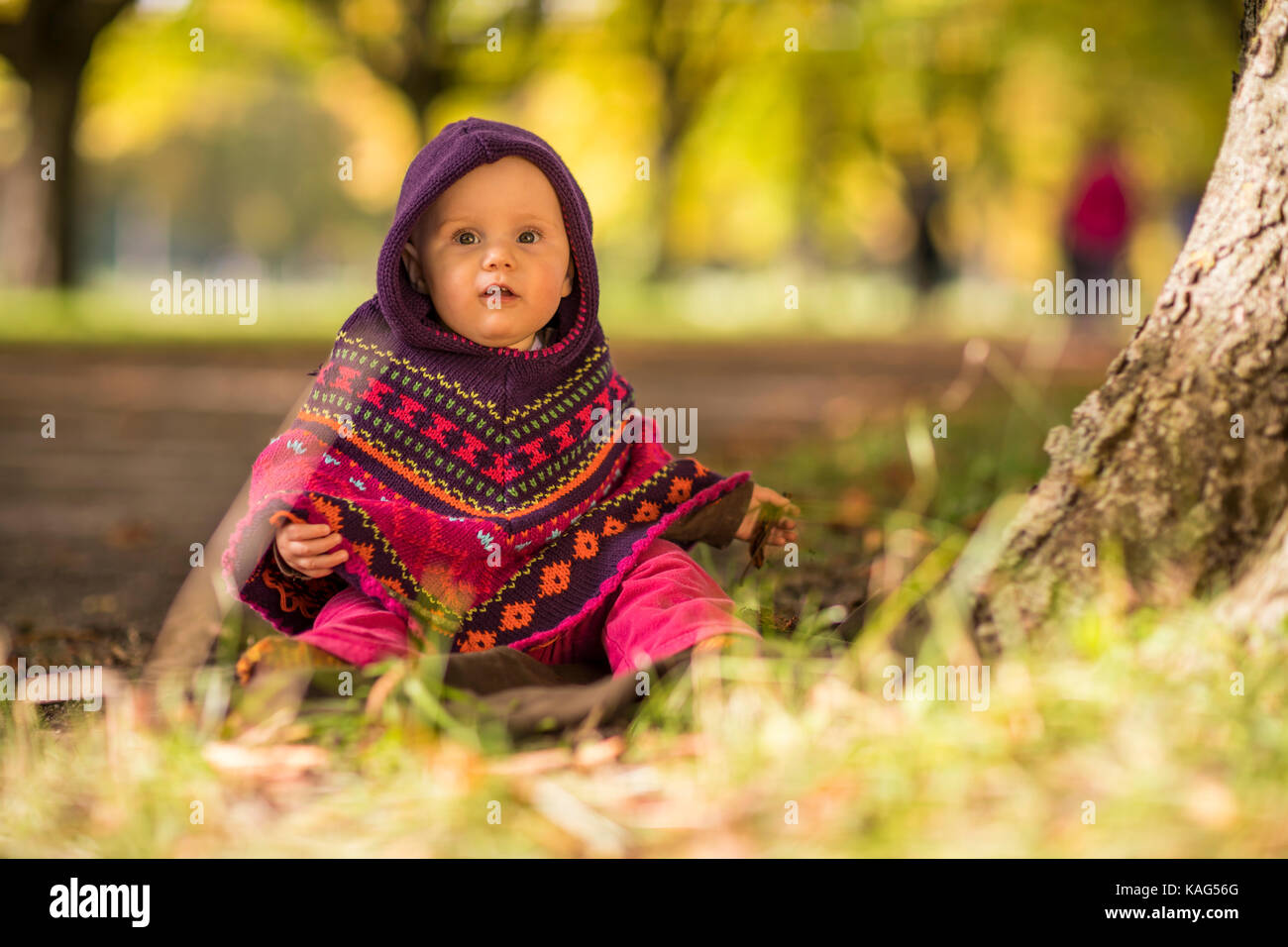 cute happy child baby playing outside in autumn fall sun Stock Photo ...