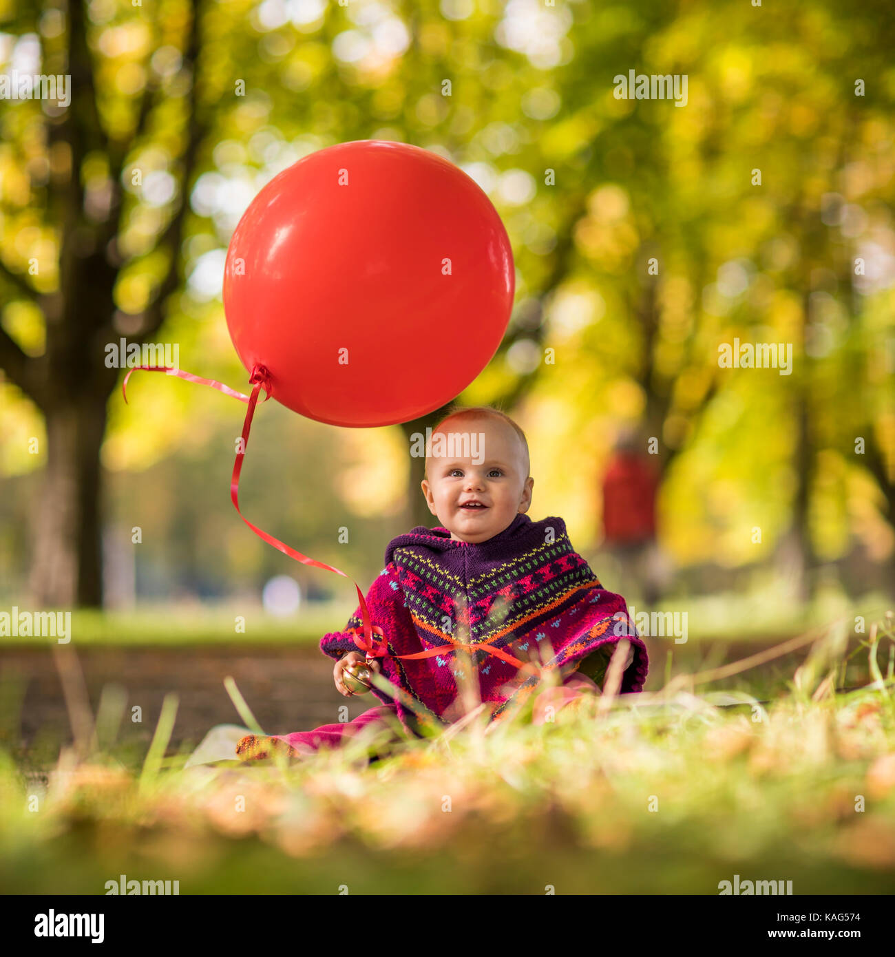 cute happy child baby playing outside in autumn fall sun Stock Photo ...