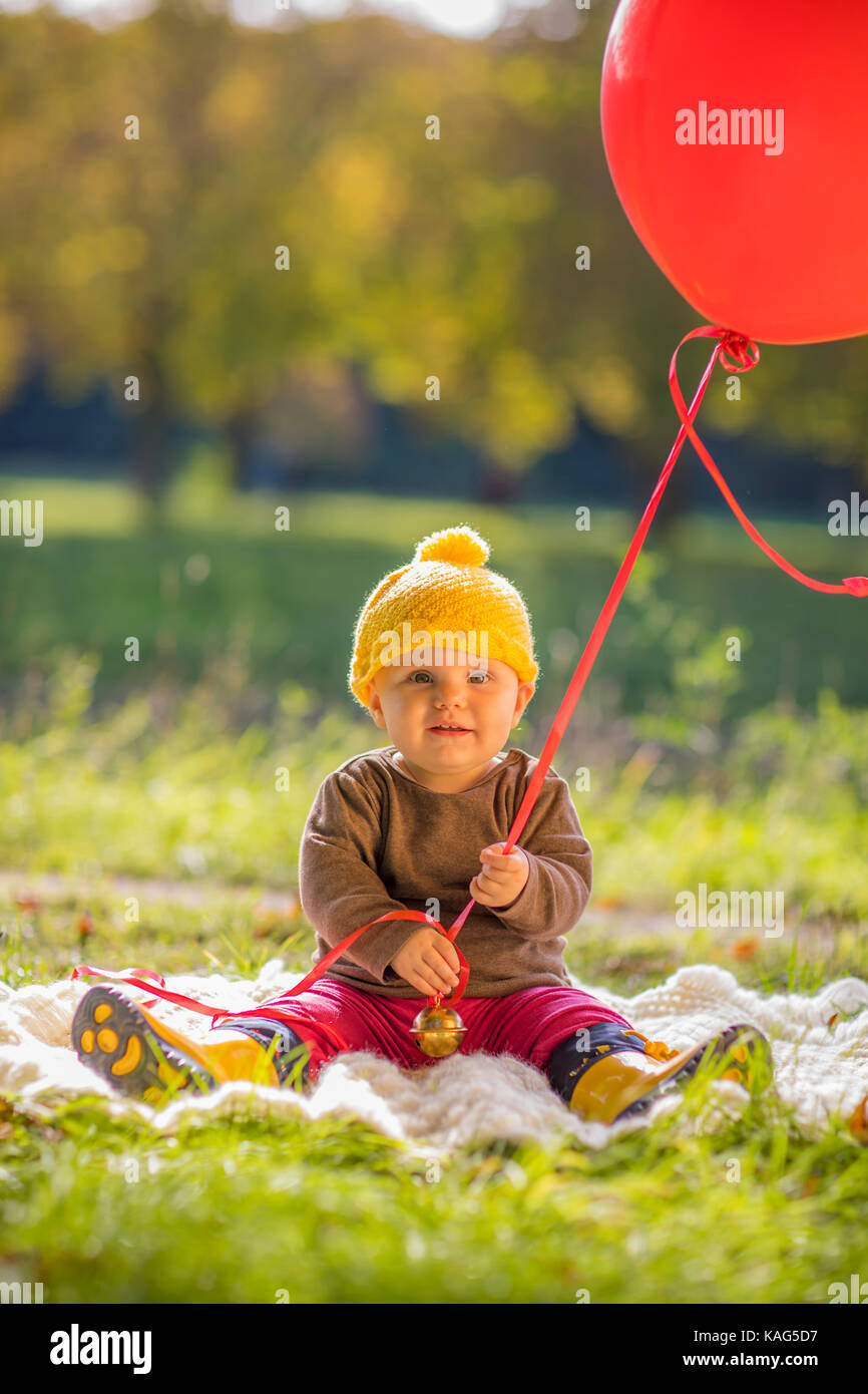 Child walk balloon hi-res stock photography and images - Alamy
