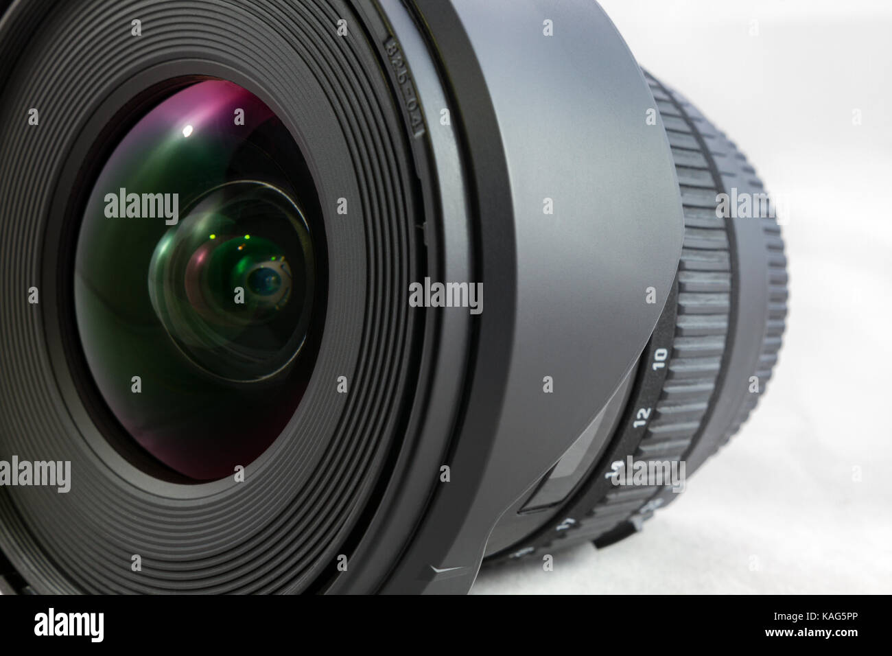 Black camera lens isolated on white background closeup, partial view ...