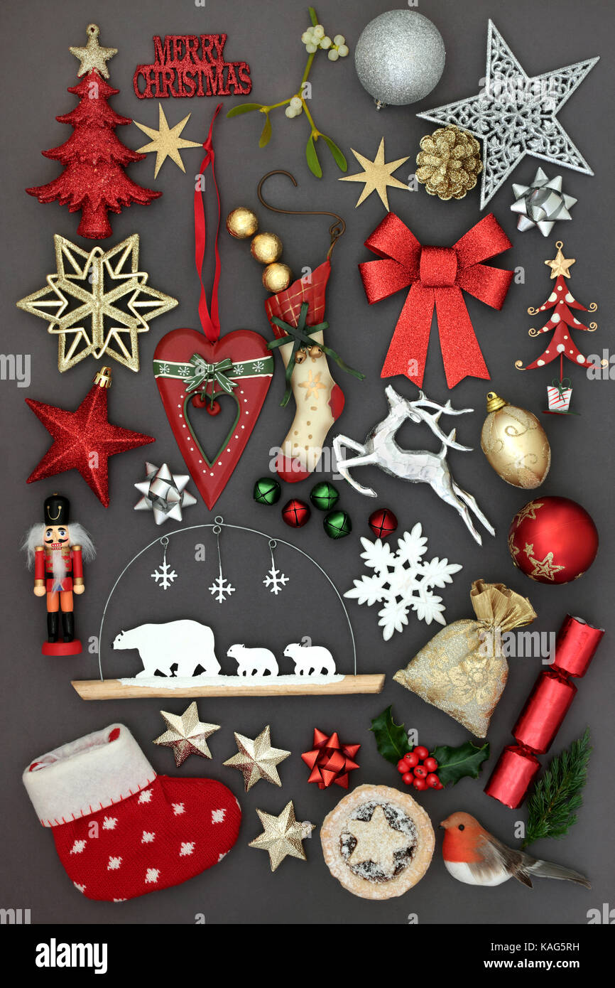 Symbols of christmas with bauble decorations, holly and mistletoe on ...