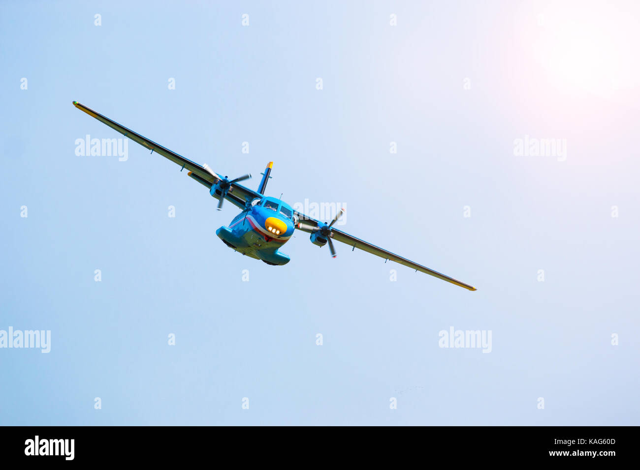 Aircraft L 410 Turbolet in flight in blue sky at sunny day in Prague ...