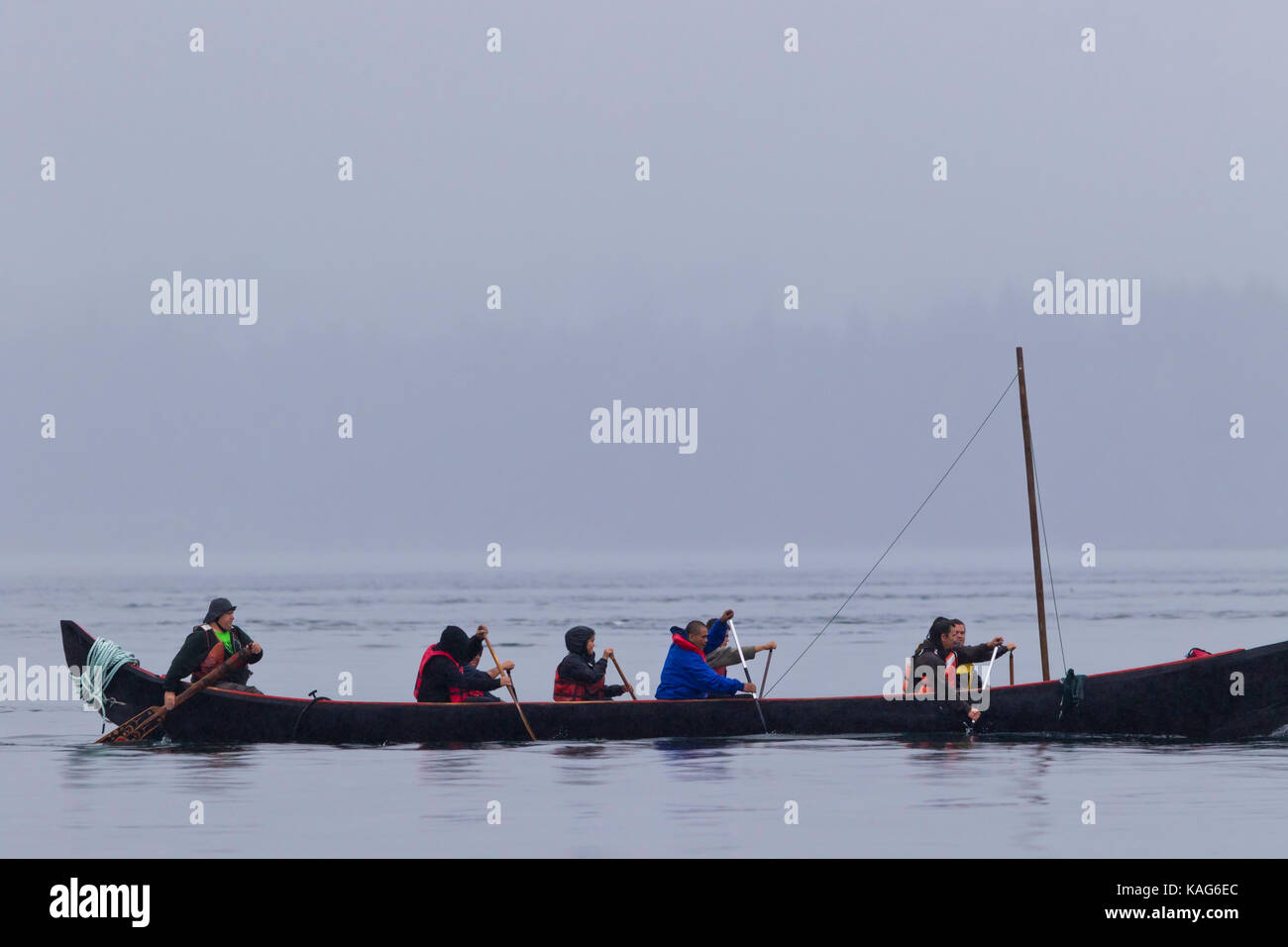 First Nations natives in war canoe paddling toward Swanson Island in ...