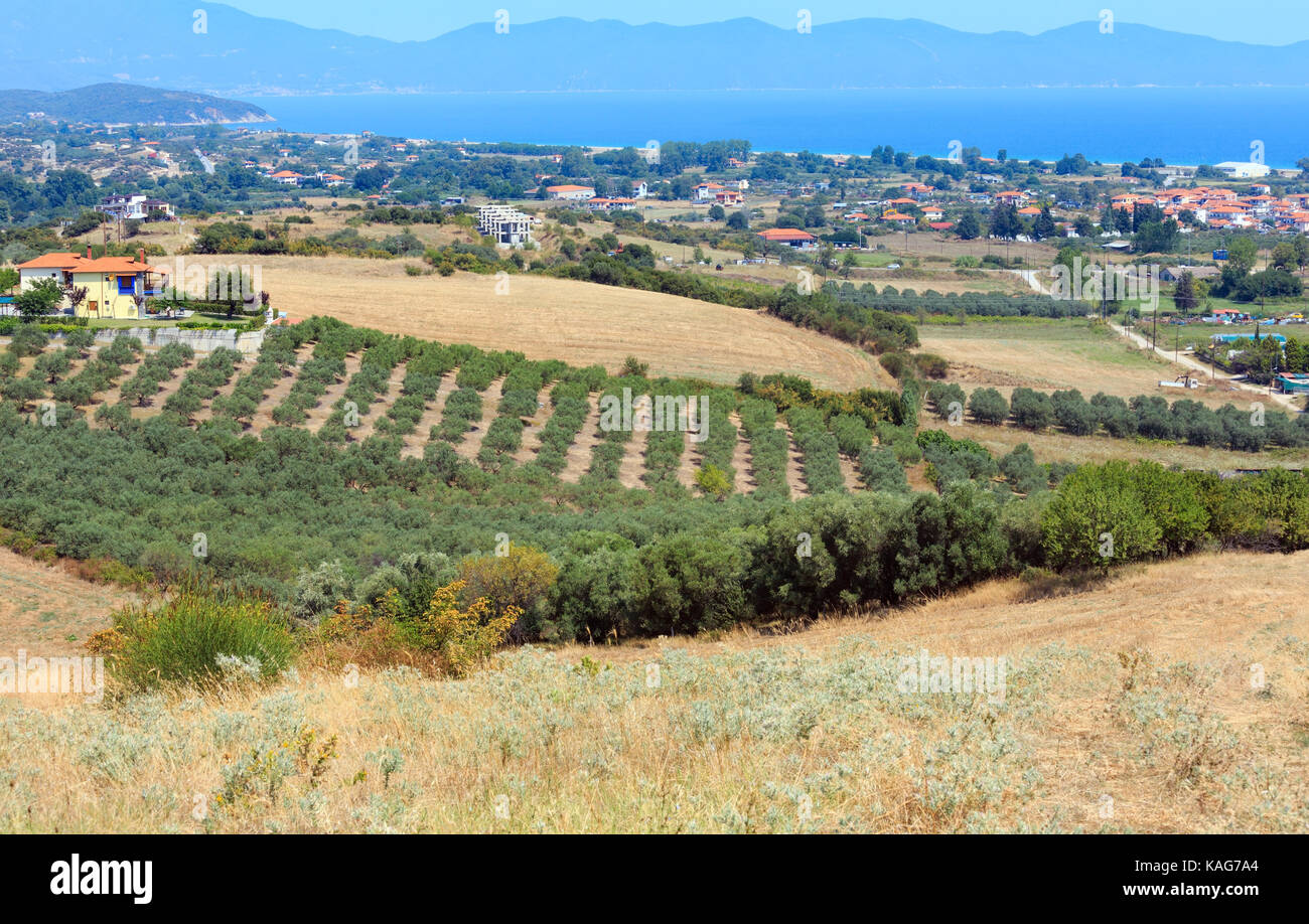 Beautiful summer sea coast view with rural scene (Athos Peninsula ...