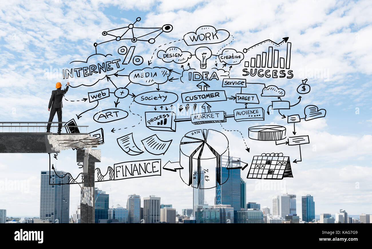 Businessman drawing business conceptual sketches Stock Photo - Alamy