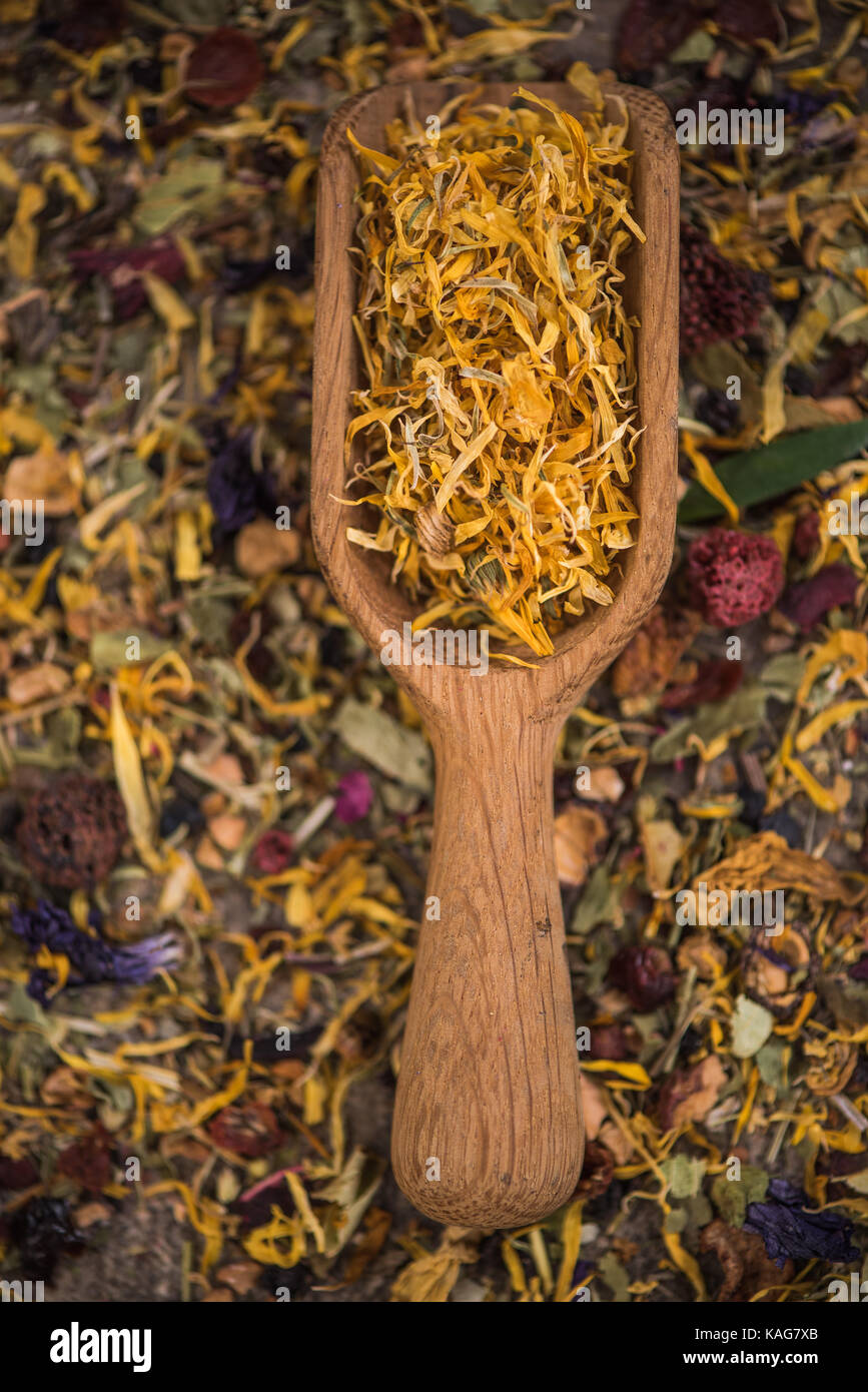 Wooden spoon on loose herbal tea Stock Photo - Alamy