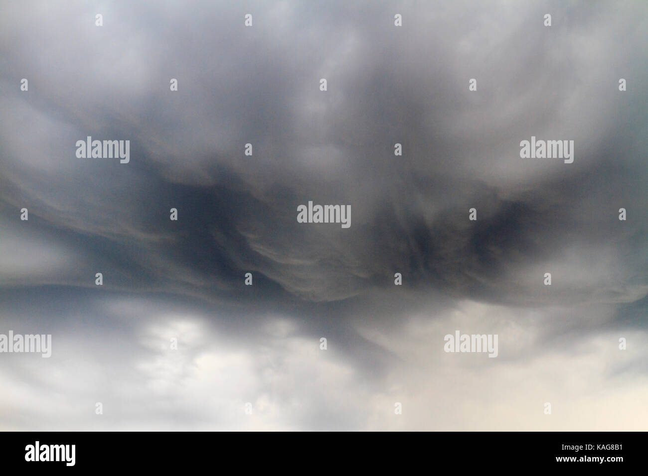 unusual curly rain clouds , bad weather, cold weather, tornado Stock ...