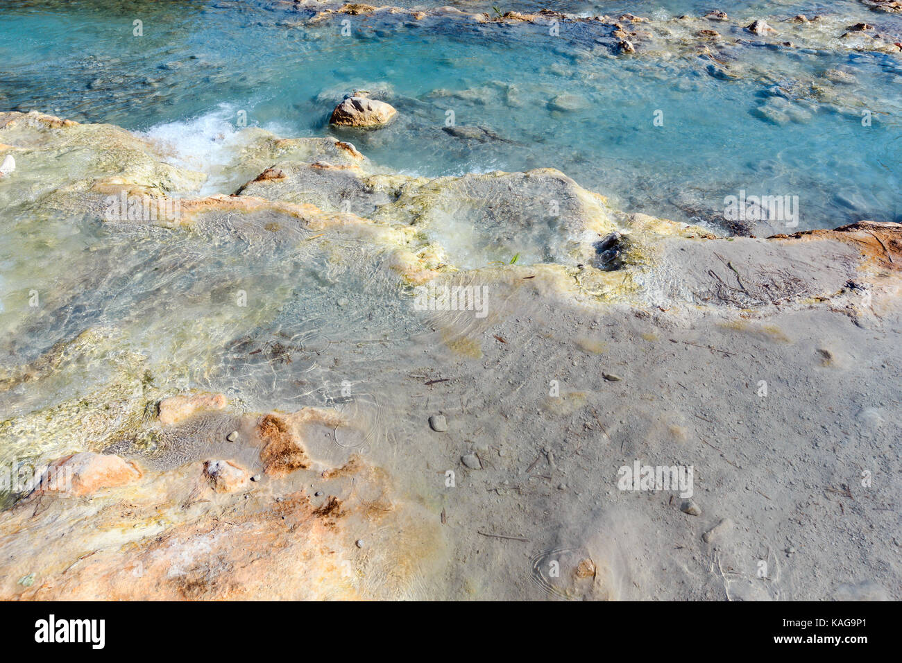 Natural spa with waterfalls and hot springs at Saturnia thermal baths ...