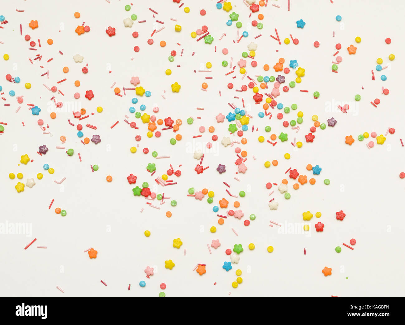 Colorful sugar decor on a white background Stock Photo - Alamy