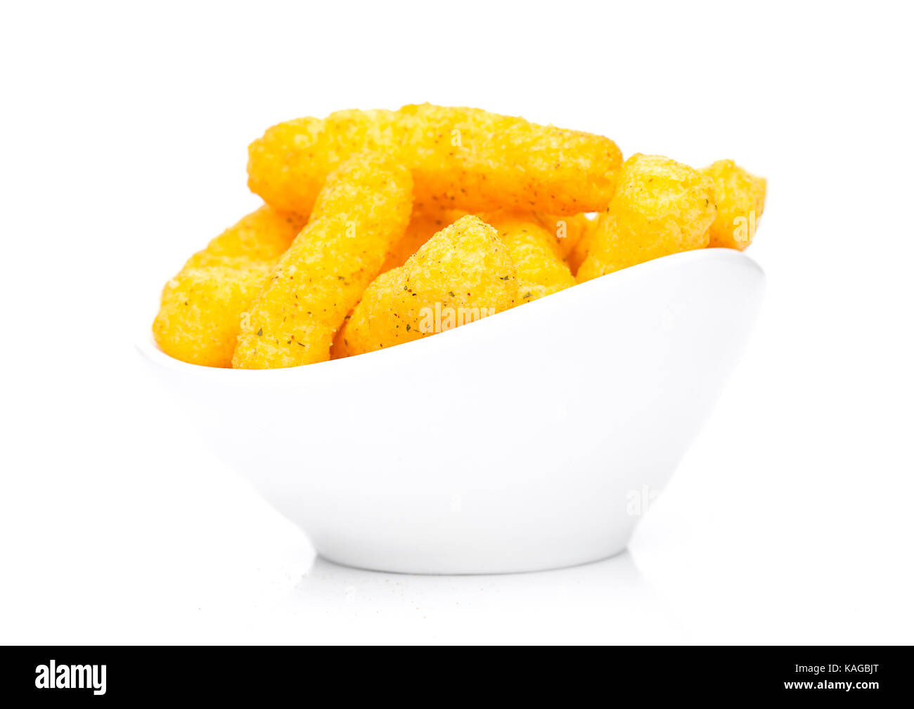 Cheese yellow corn snacks in white bowl on white background Stock Photo ...