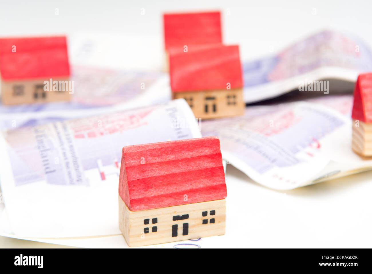 Property price and sales of house, model homes with money Stock Photo ...