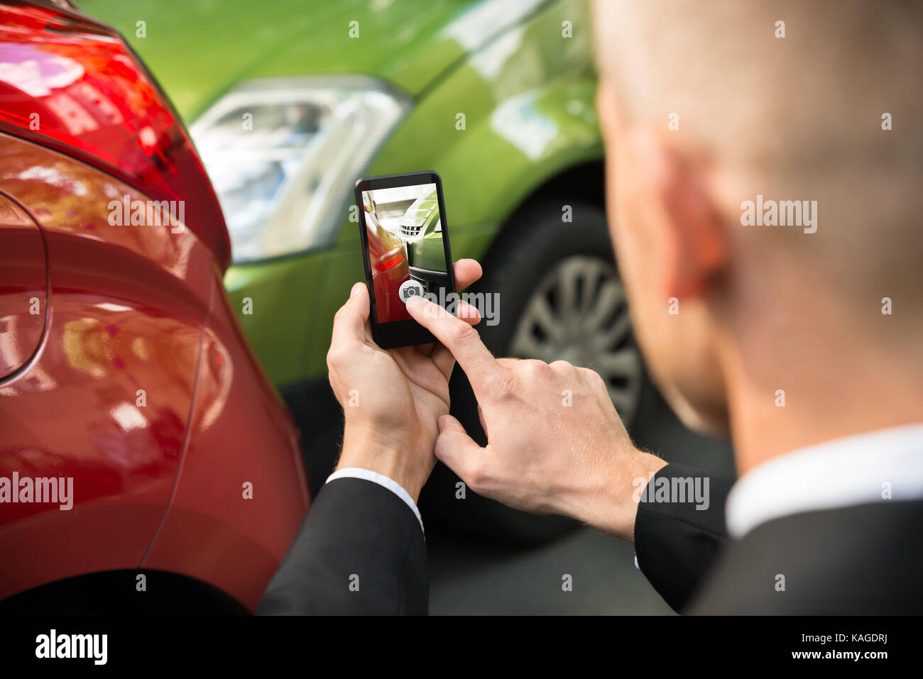 Male Driver Photographing With His Cellphone After Traffic Collision ...
