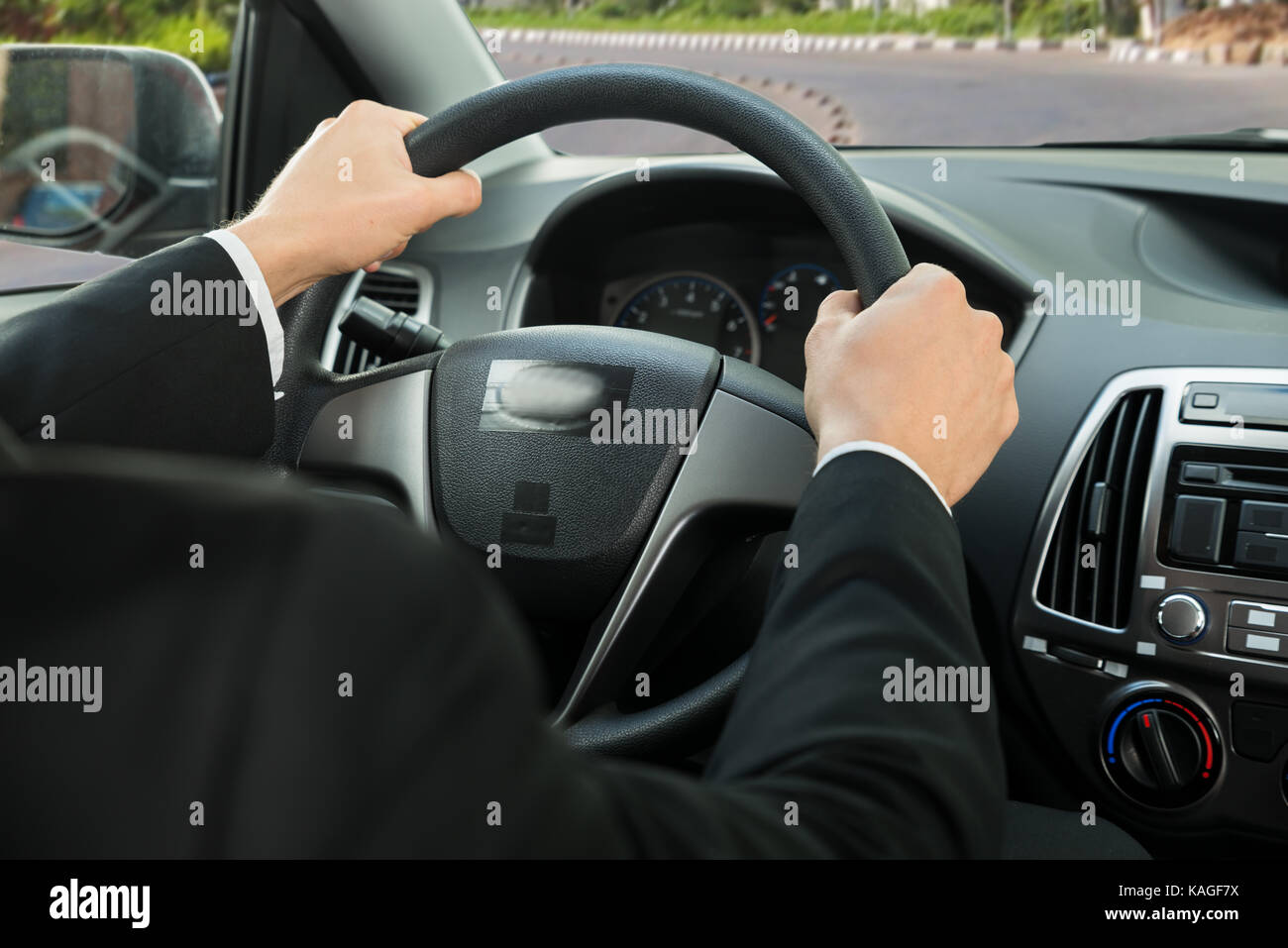 Close-up Of A Driver's Hand On Steering Wheel While Driving Car Stock ...