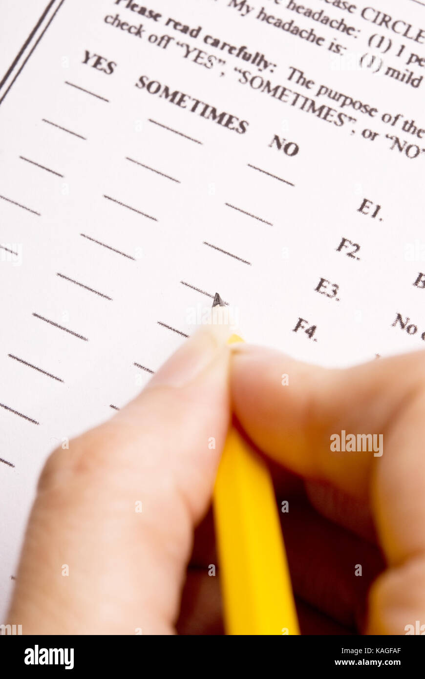 hand filling a questionnaire or test Stock Photo - Alamy