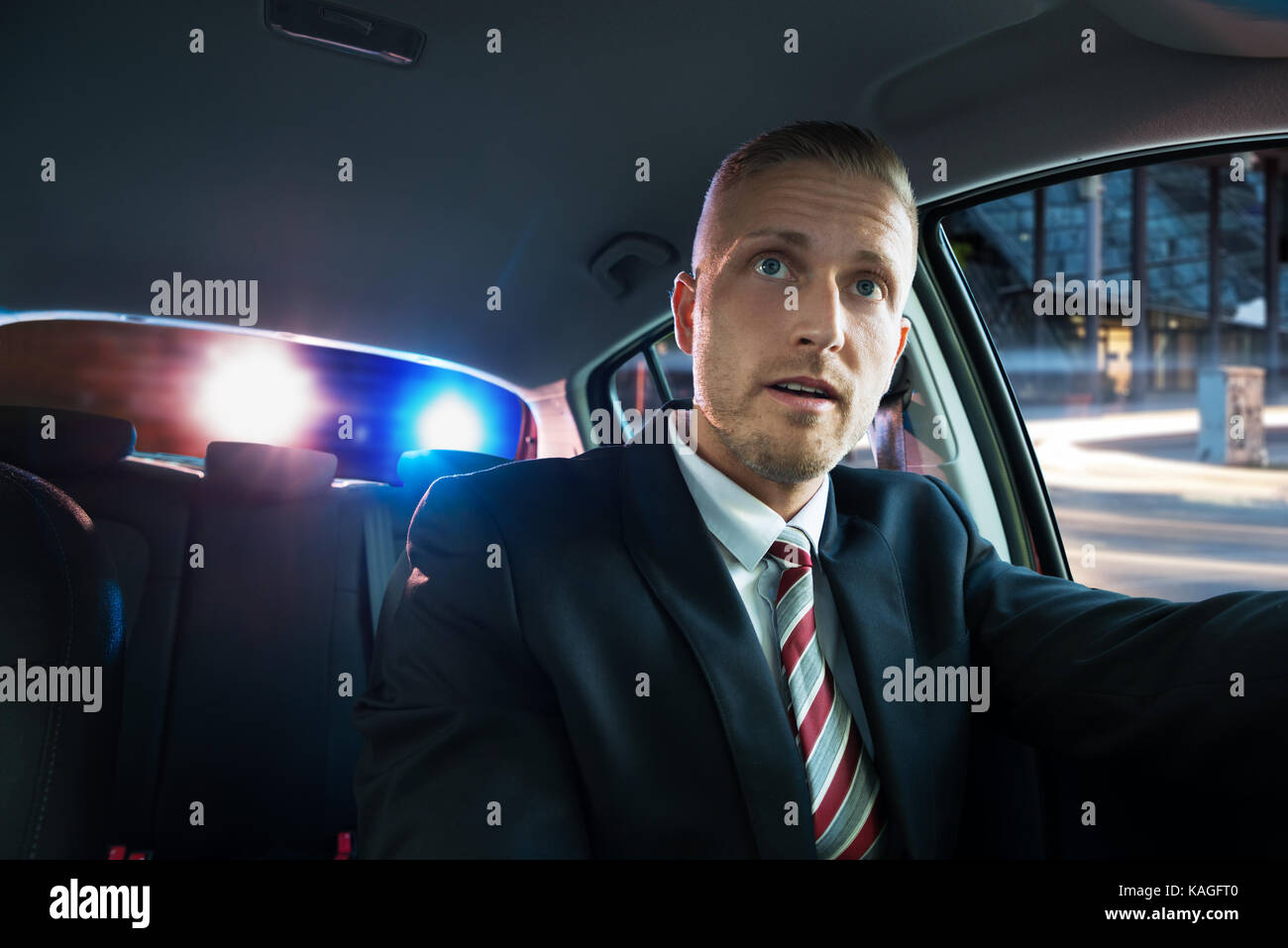 Portrait Of A Young Scared Man Pulled Over By Police Stock Photo - Alamy