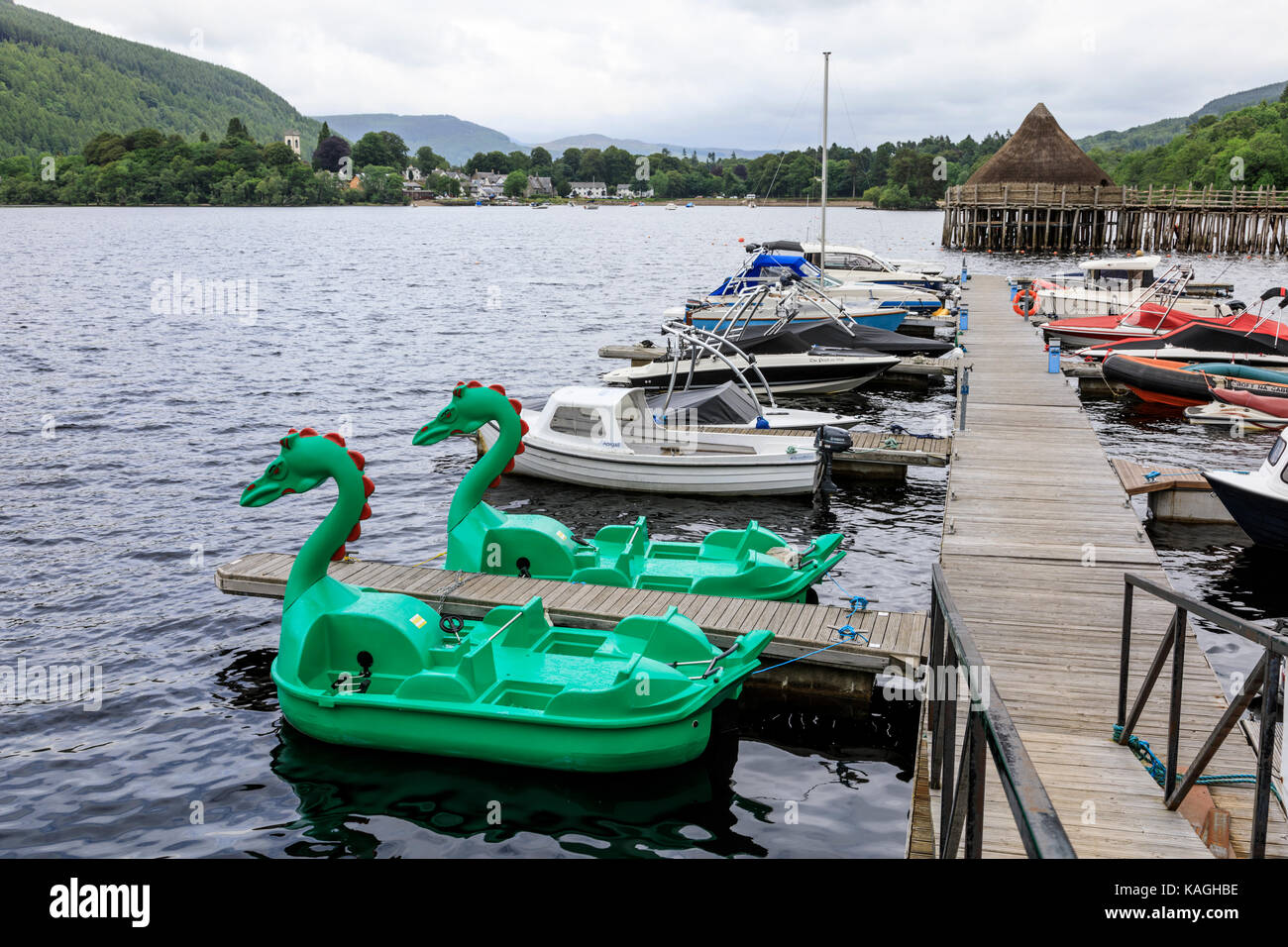 Pair of green Nessie pedalos or paddle boats Stock Photo - Alamy