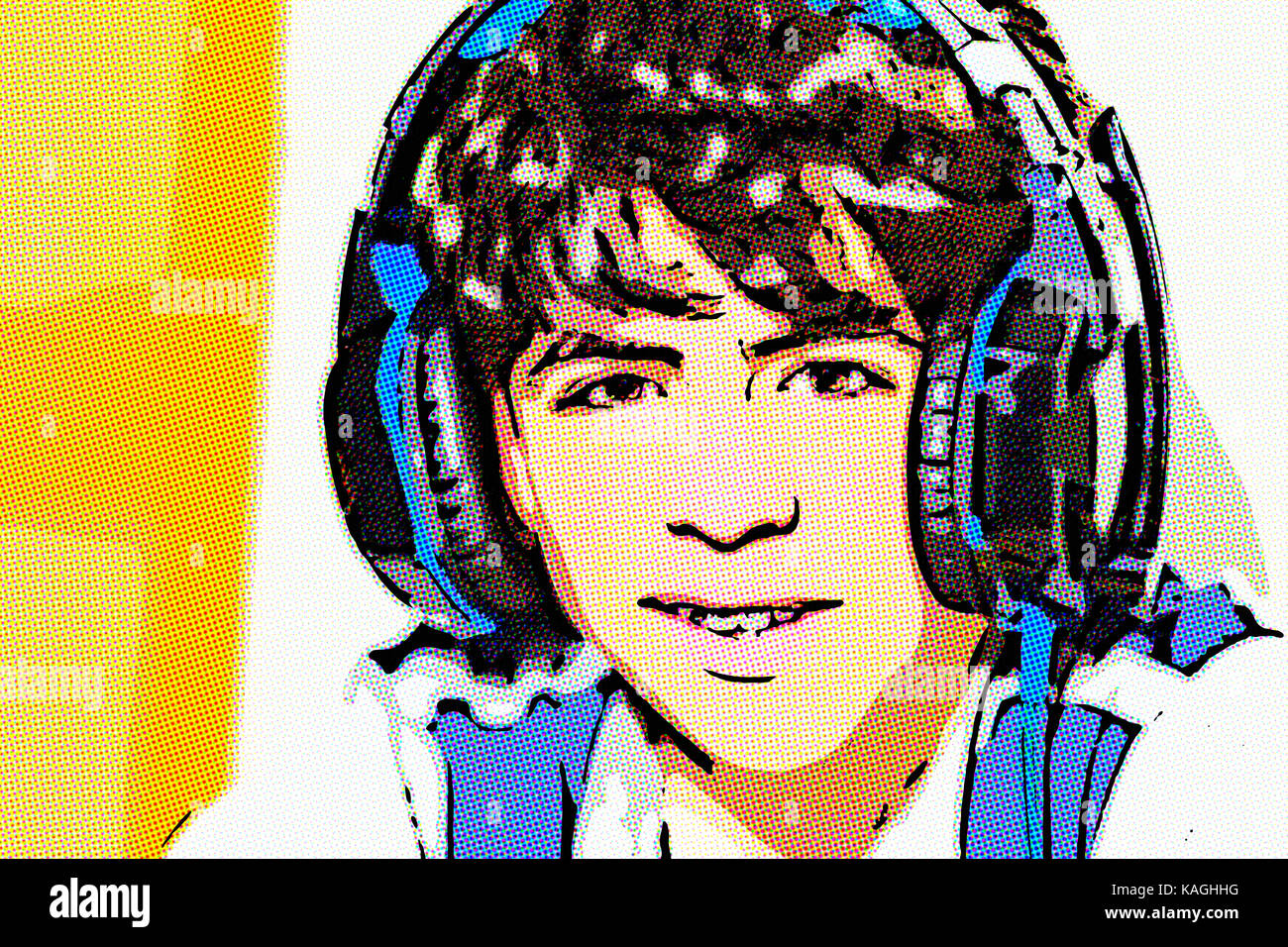 boy with braces wearing headphones while playing with video games Stock ...