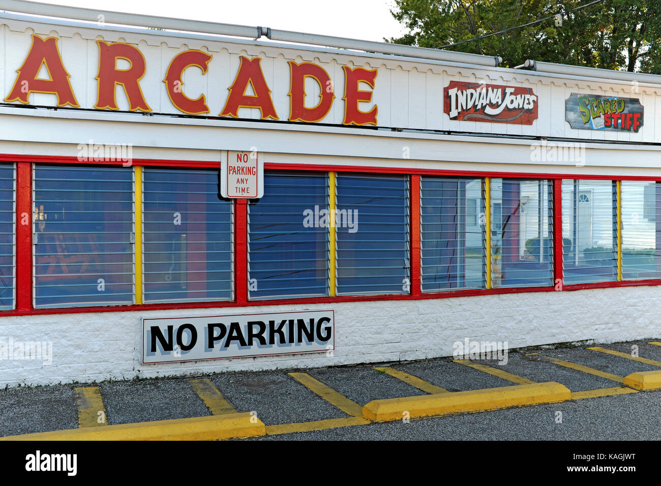 An old-fashioned gaming arcade is closed for the season in the summer ...