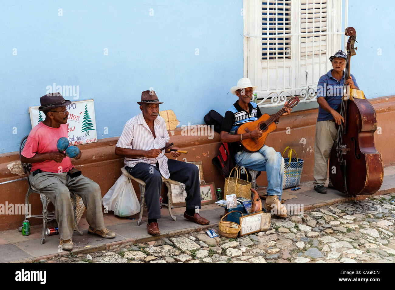 A traditional Cuban band play on a cobbled street in the centre of ...