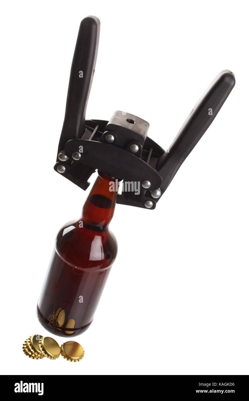 bottle capping process as used in homebrewing Stock Photo - Alamy