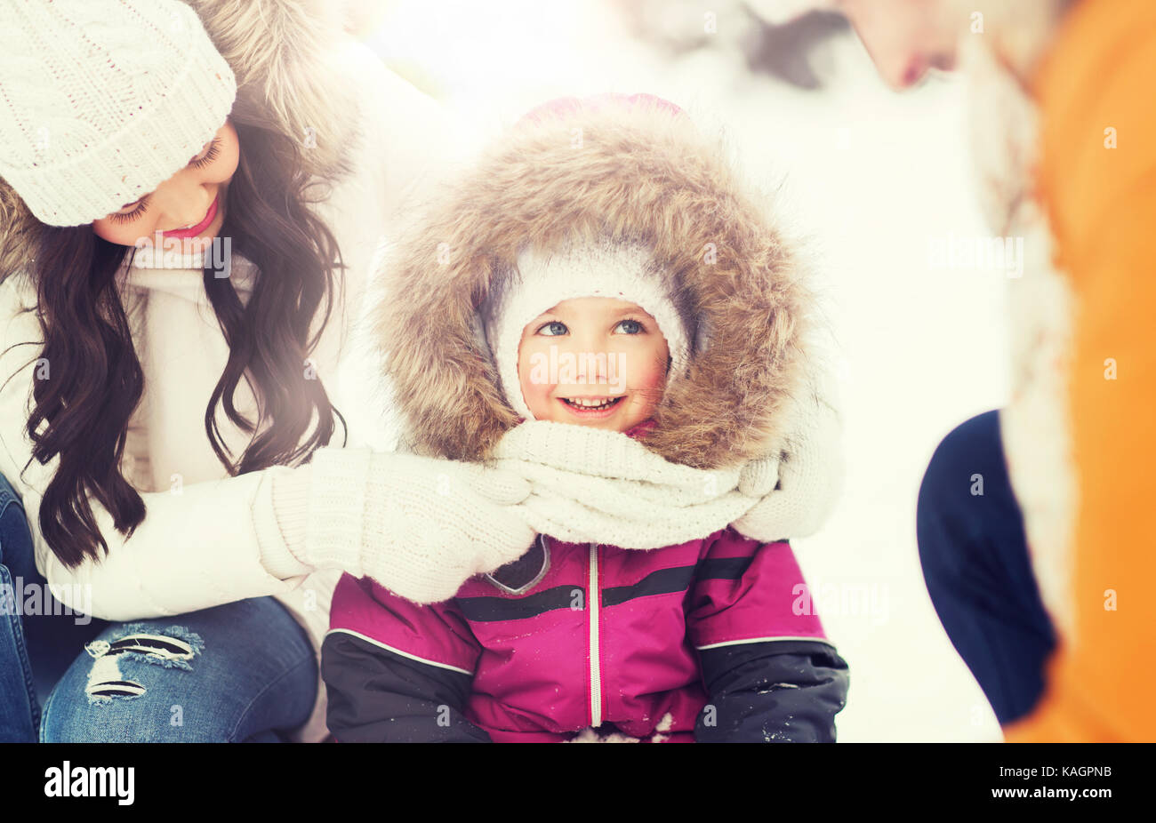happy family with child in winter clothes outdoors Stock Photo - Alamy